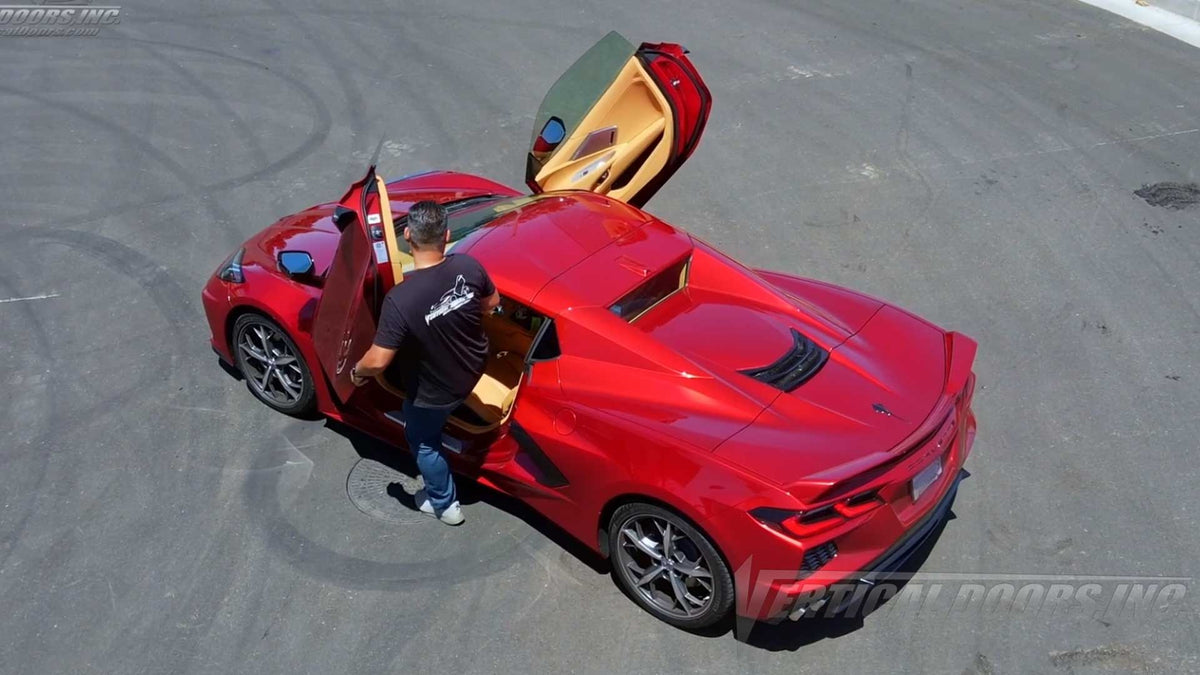 Vertical Lambo Doors Kit installed on a Red Chevrolet Corvette C8 by V ...