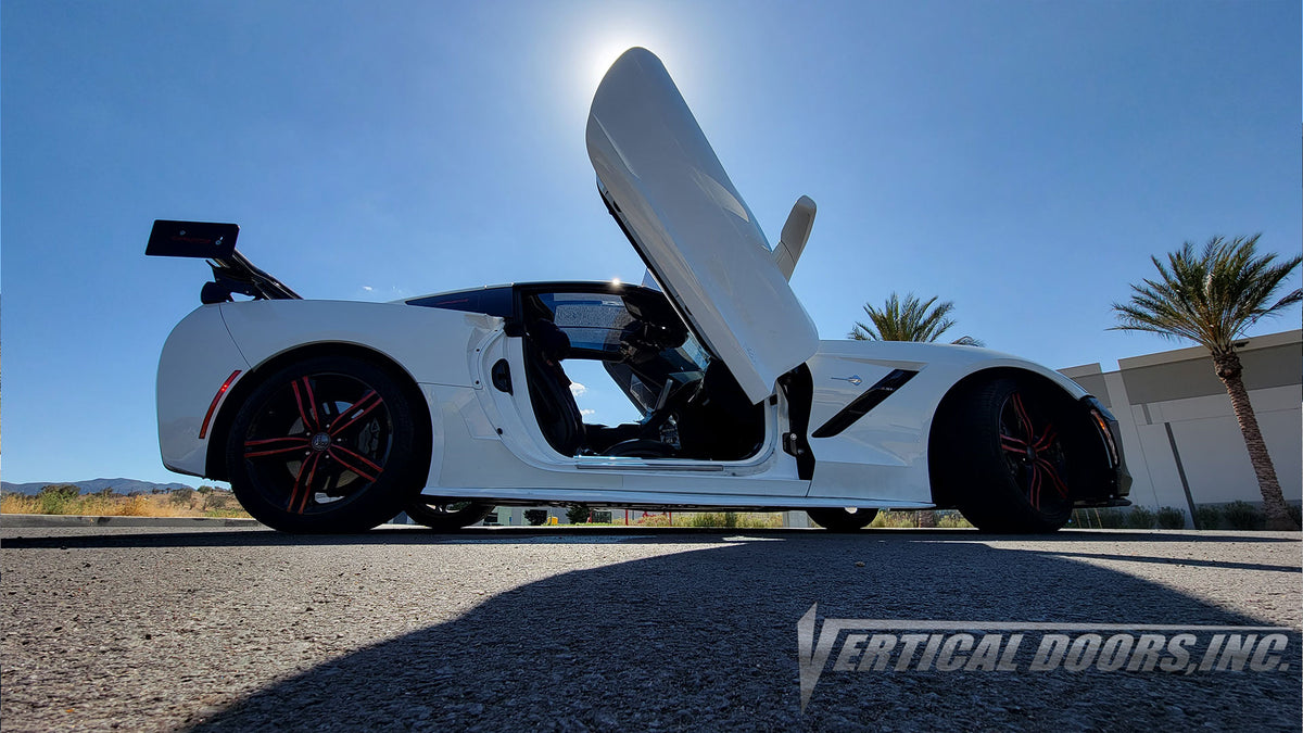 White Chevrolet Corvette C7 from California with vertical lambo door c ...